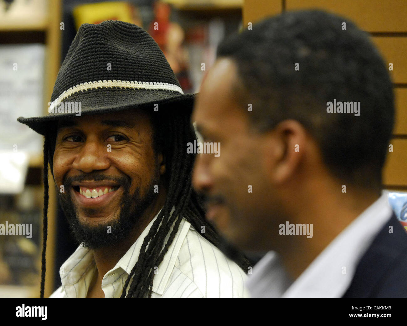 Duane Deterville (left) loks on while Jerry Thompson talks about their ...