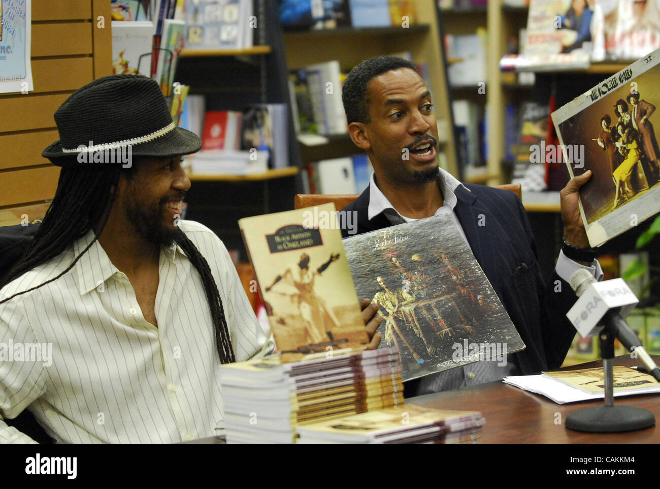 Jerry Thompson (right) holds up his Pointer Sisters albums while Duane ...