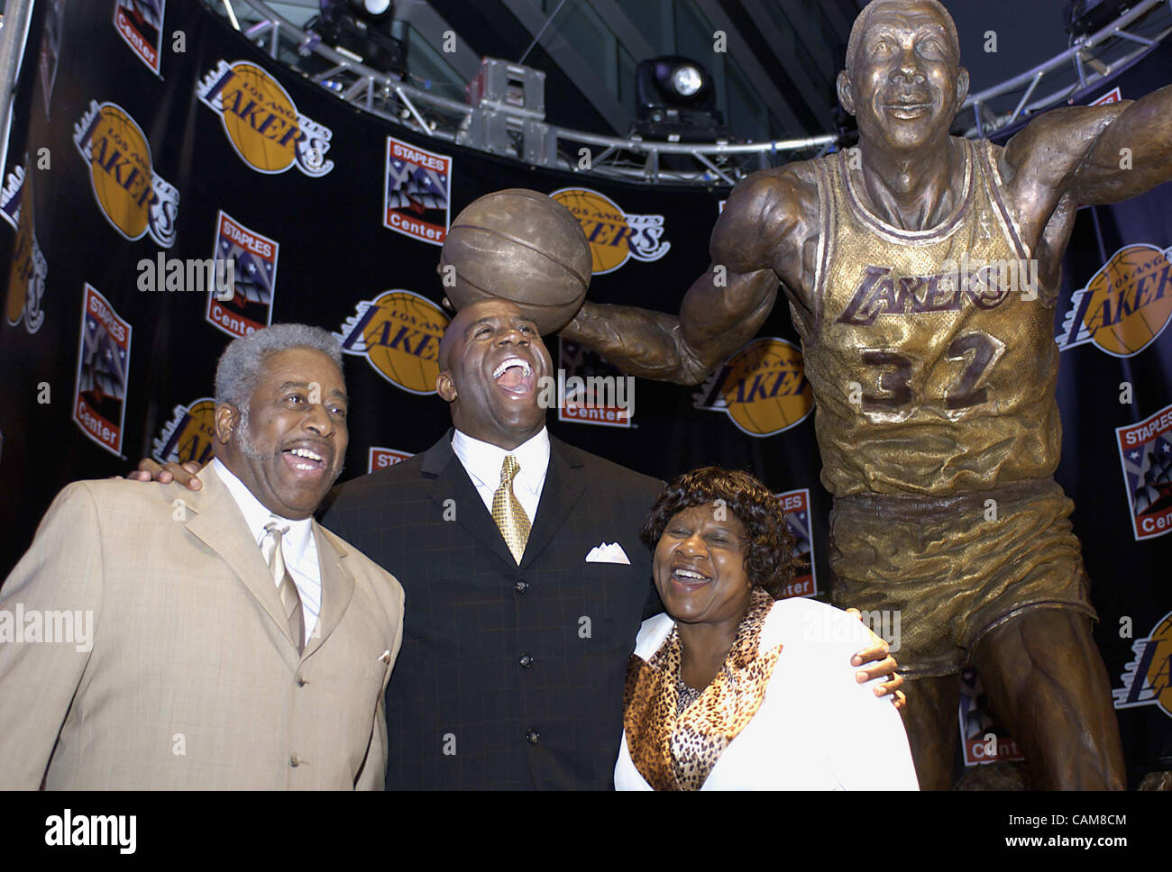 Feb. 11, 2004 - Los Angeles, USA - Earvin ''Magic'' Johnson shares a ...