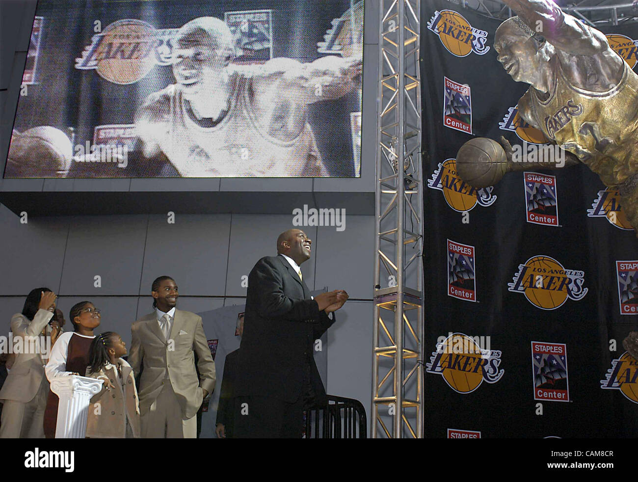 Feb. 11, 2004 - Los Angeles, USA - Earvin ''Magic'' Johnson, with his ...
