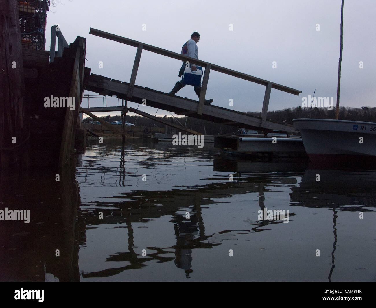 Quahoger (shellfisherman) ready for work raking for clams in ...
