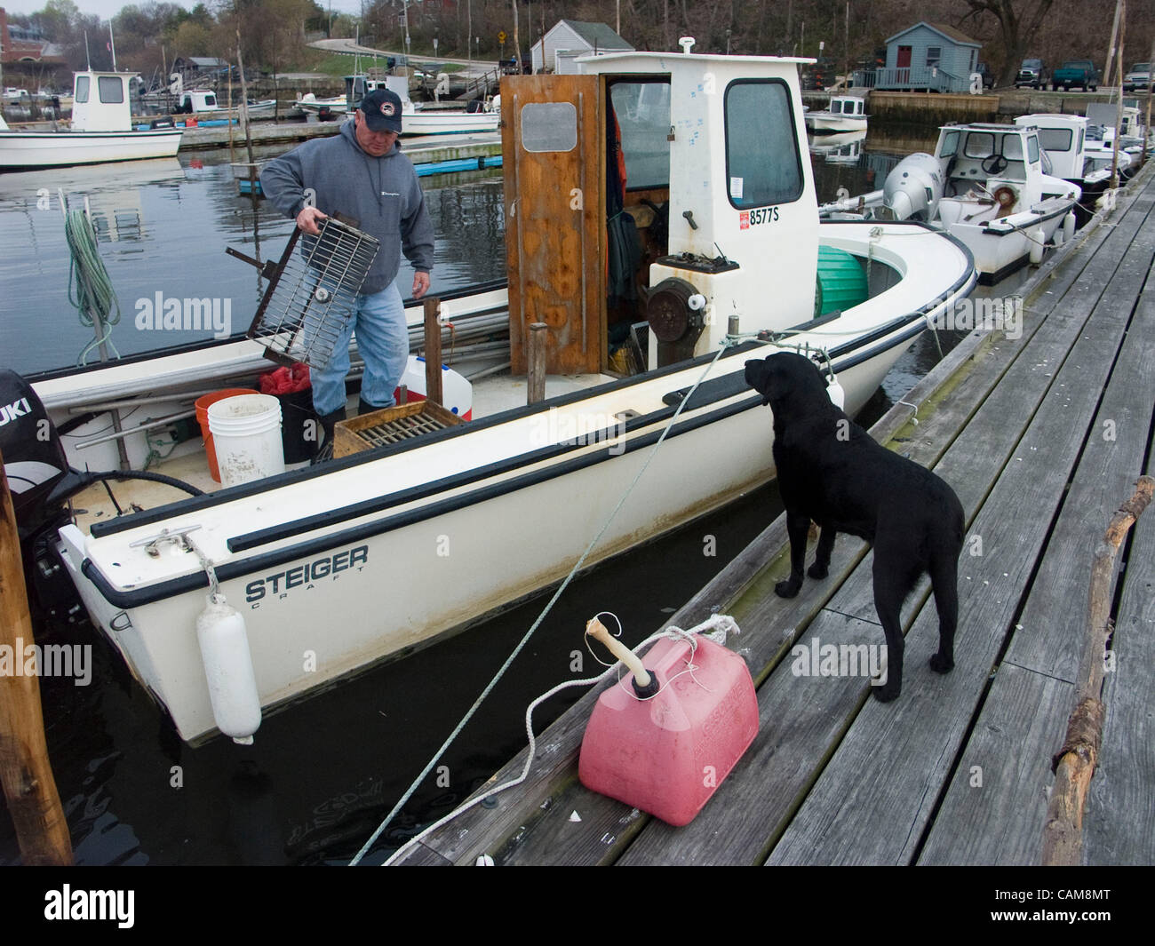 Quahoger (shellfisherman) Bill Bergan readies his boat to work raking ...