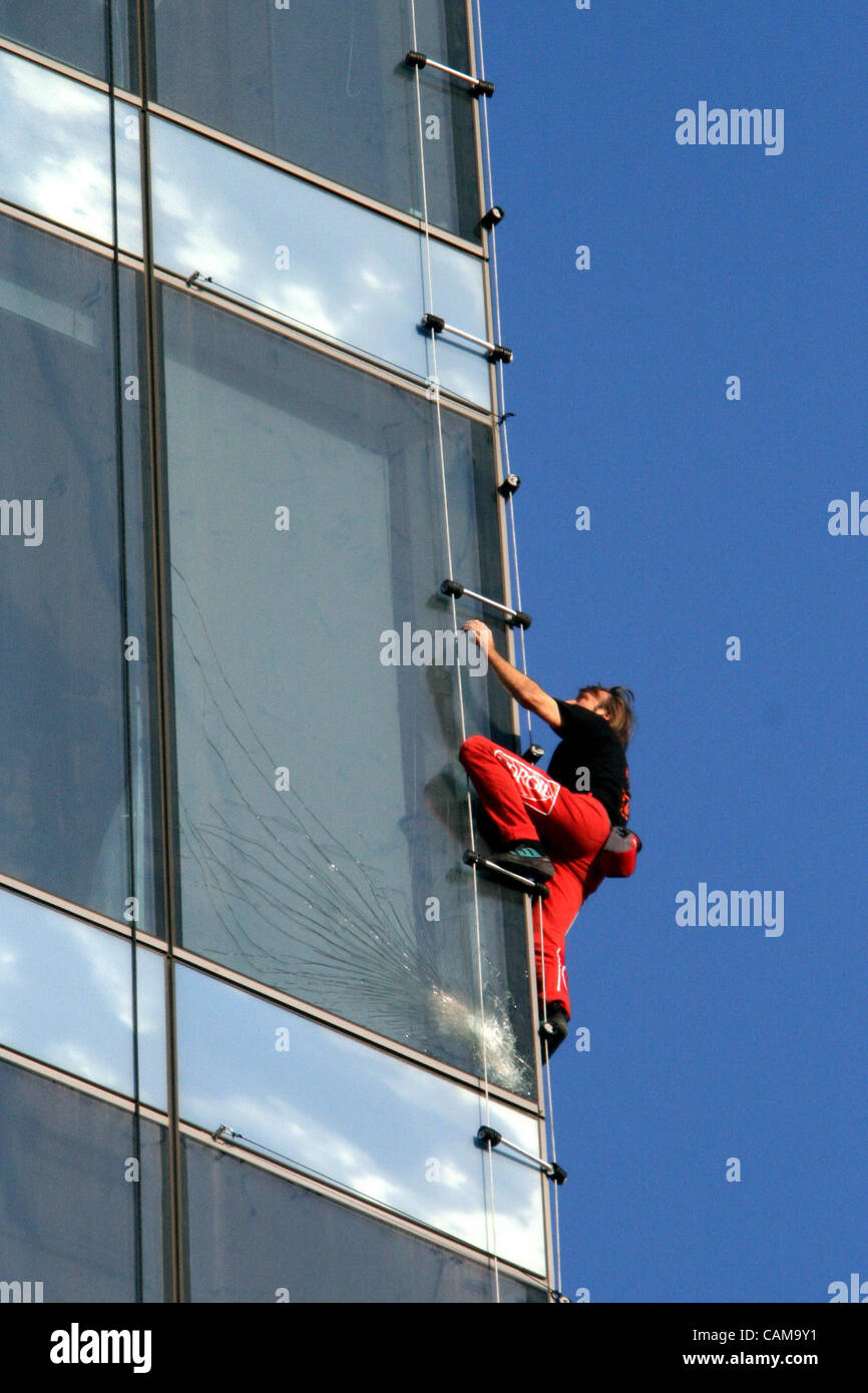 French urban climber Alain Robert scaled the 242-meter Federation Tower ...