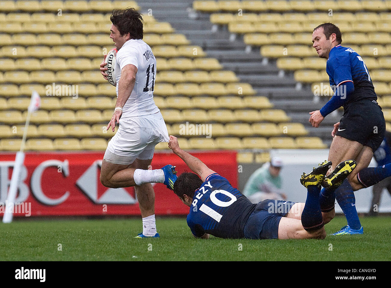 England's Mat Turner eludes a tackle on his way to scoring England's ...