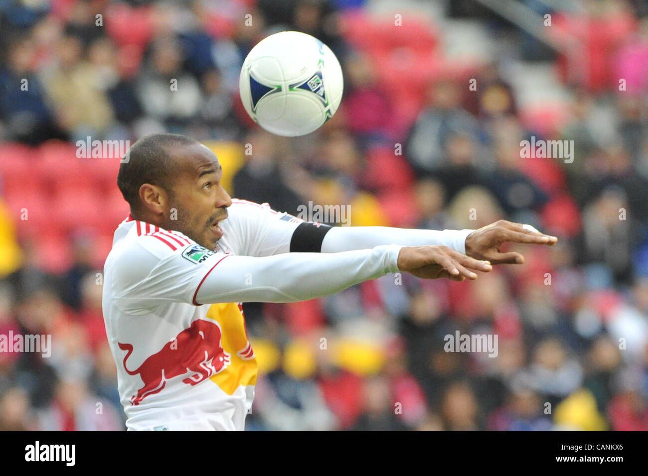 New York Red Bull forward THIERRY HENRY (14) heads the ball at Red Bull ...