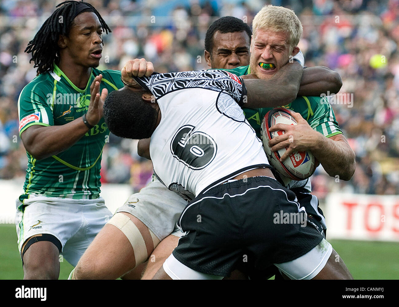 South Africa's Kyle Brown (R) tries to push away Fiji's No. 6 Nikola ...
