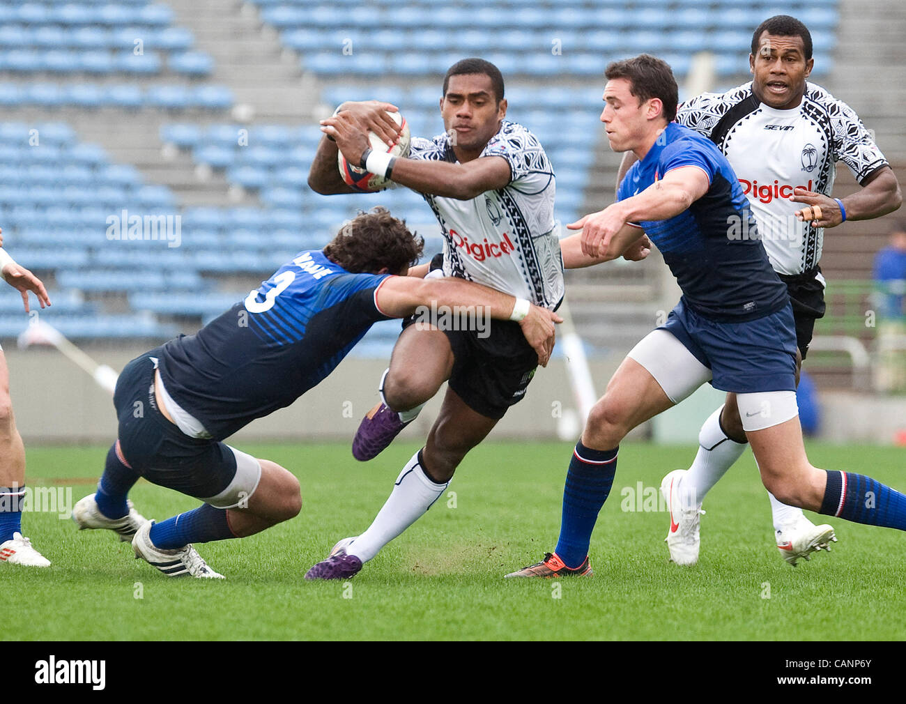 Fiji's No. 7 Isikeli Tuiwainunu Vuruna breaks through a tackle during ...
