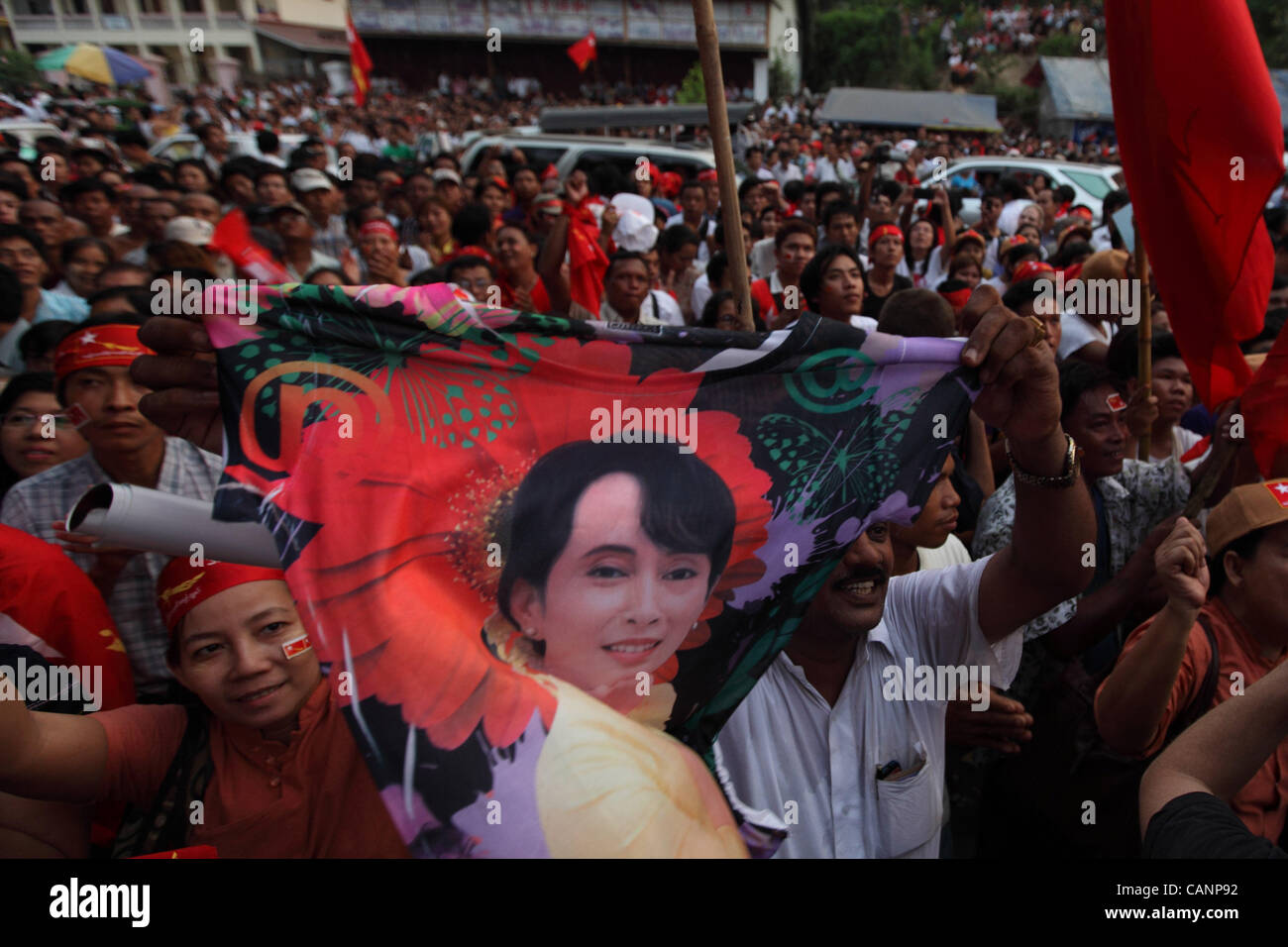 People celebrate at the headquarters of National League for Democracy ...