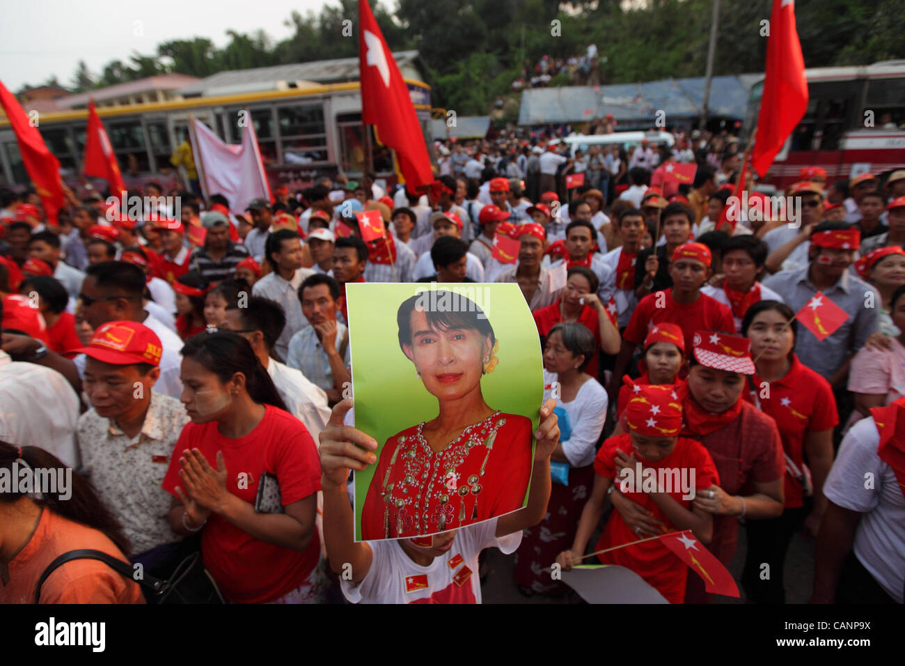 People celebrate at the headquarters of National League for Democracy ...