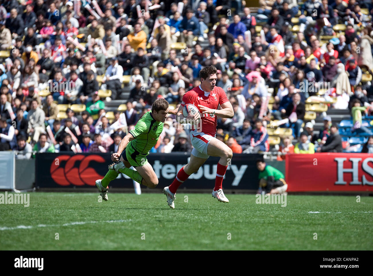 Wales's Richard Smith evades a tackle by Australia's Ed Jenkins to ...