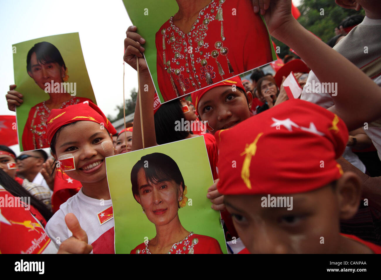People celebrate at the headquarters of National League for Democracy ...