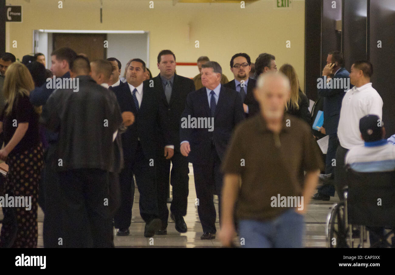 Manuel Ramos and Jay Cicinelli enter the courtroom at the Orange County ...