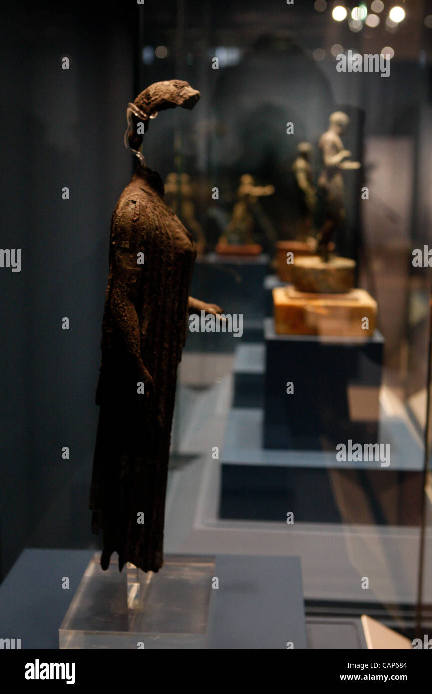 April 4, 2012 - Athens, Greece - Bronze female statuette wearing a ...