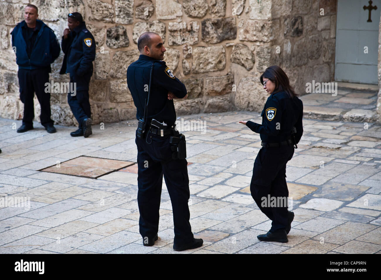 Police secure worshipers at the Holy Sepulchre as they congregate for ...
