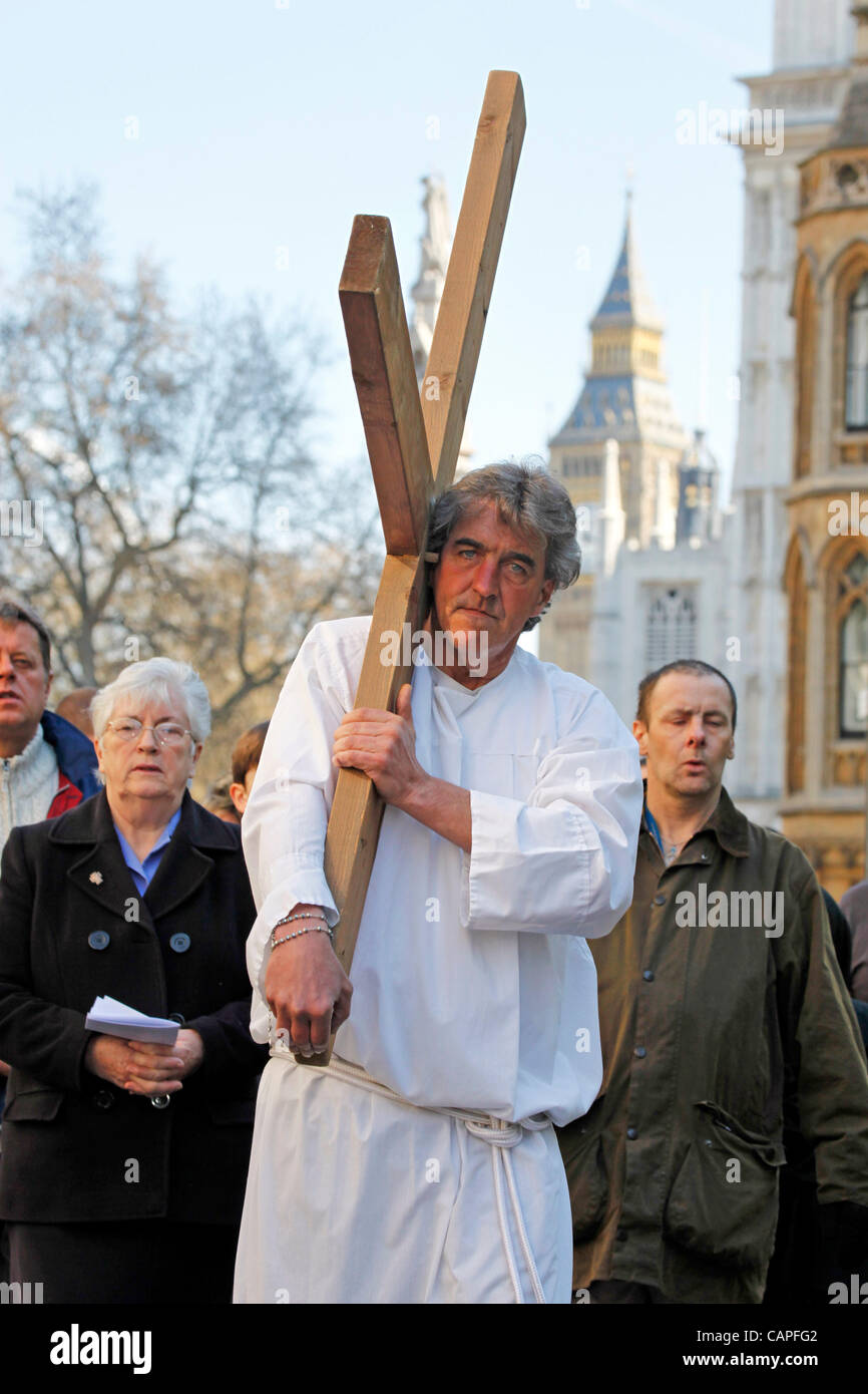 Man Carrying Cross In Westminster High Resolution Stock Photography and ...