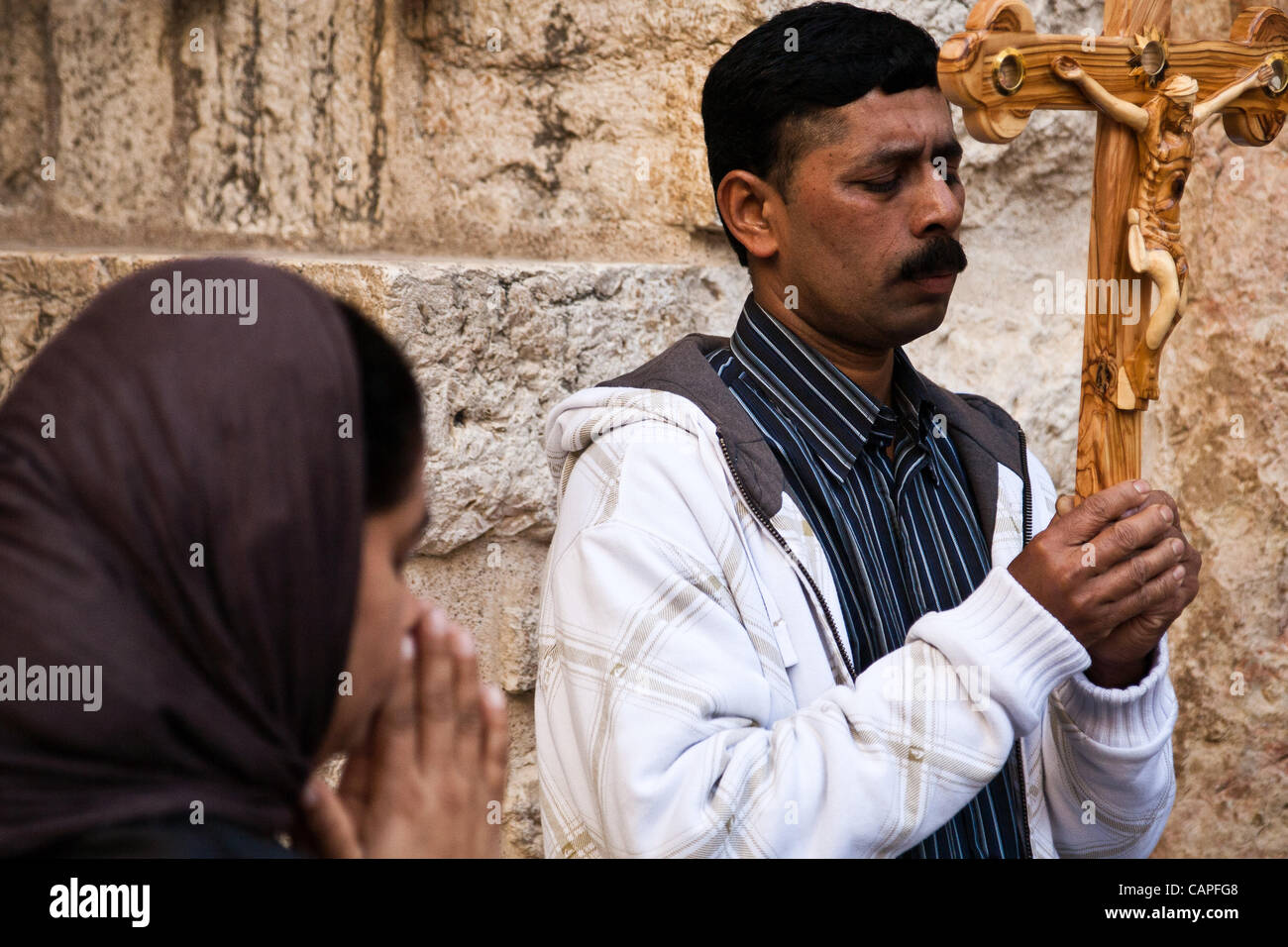 Thousands of Christian pilgrims retrace the last steps of Jesus through ...
