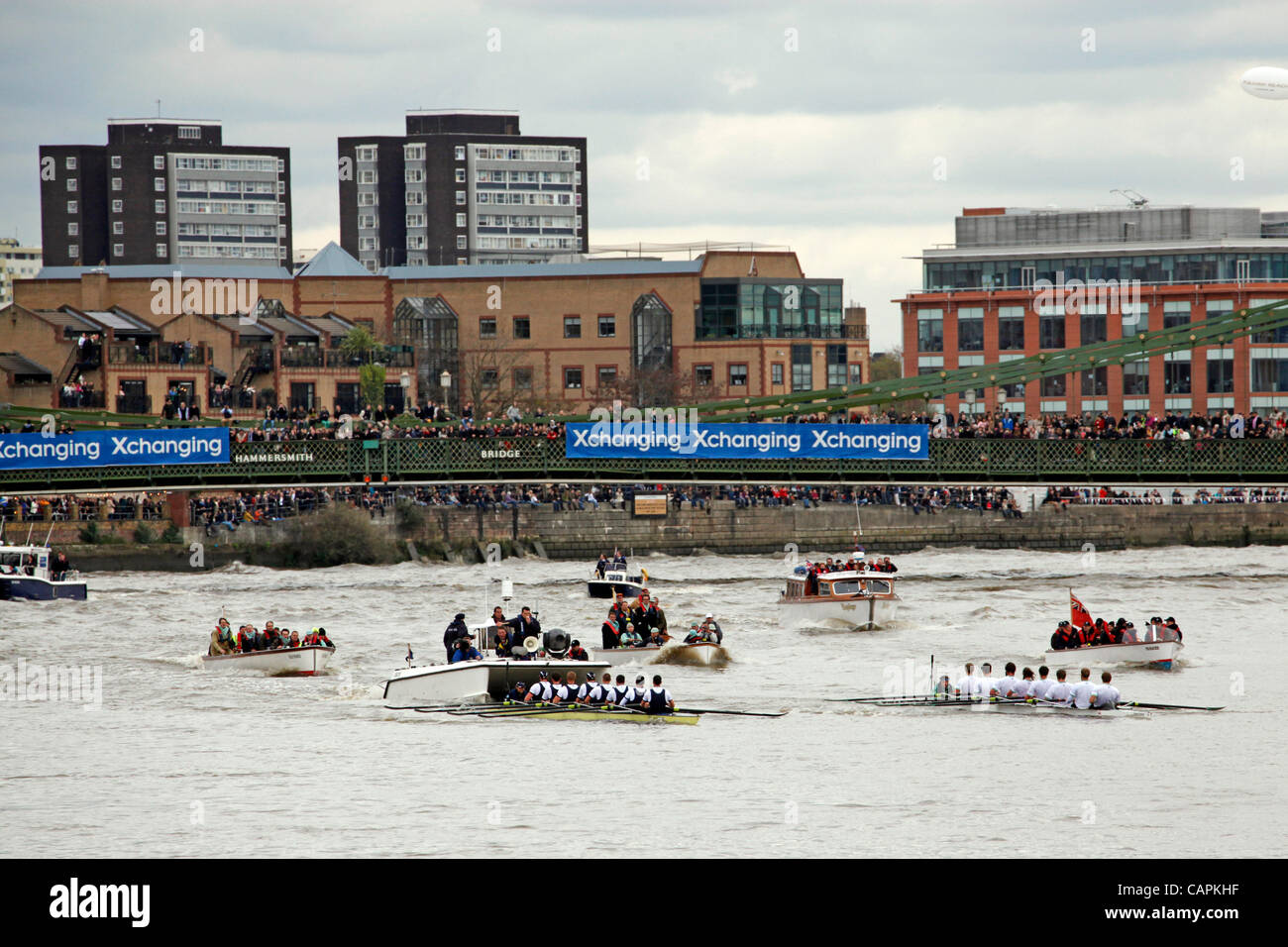 The Oxford and Cambridge Boats passing Hammersmith Bridge during the ...