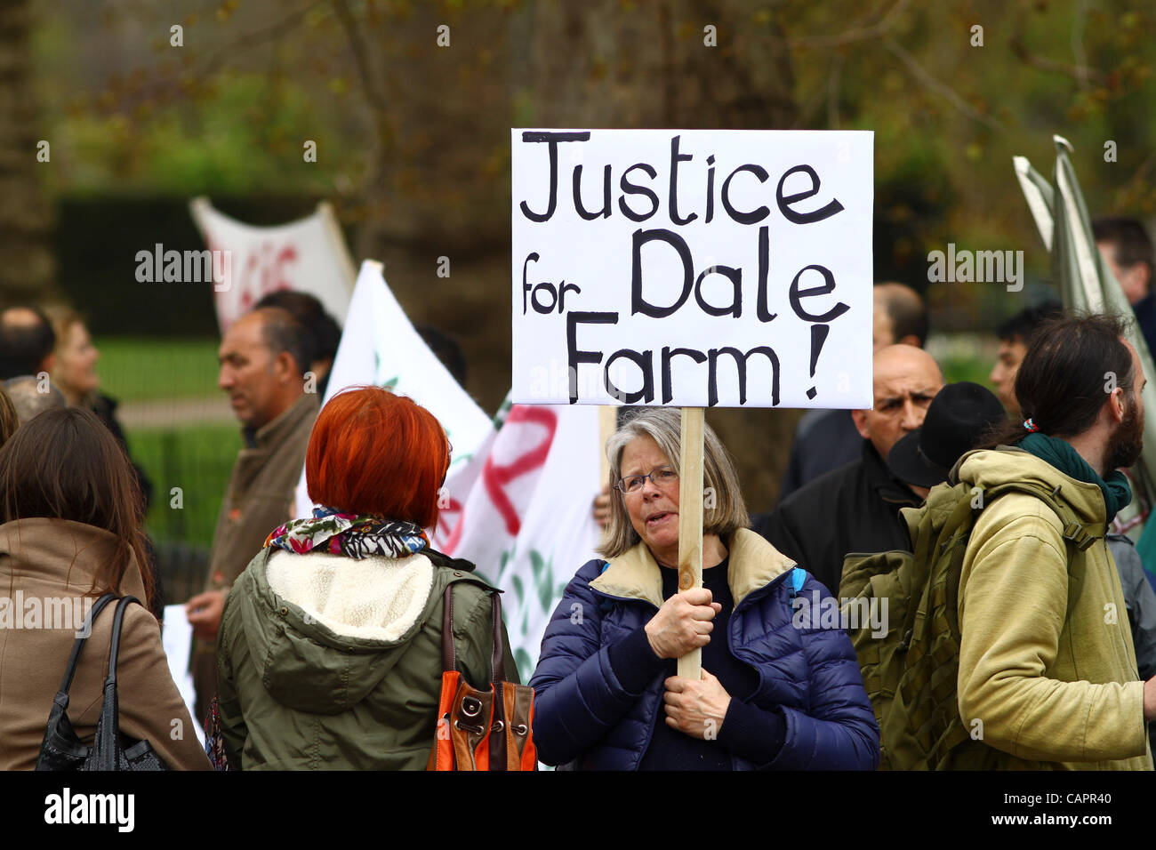 London, UK. 08/04/2012. A supporter holds a 'Justice for Dale Farm ...