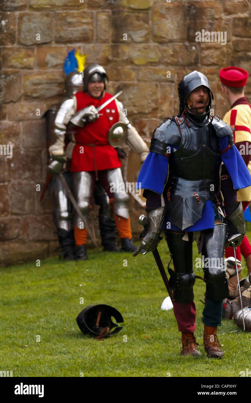 A black knight walk away victoriously from the battlefield at the ...