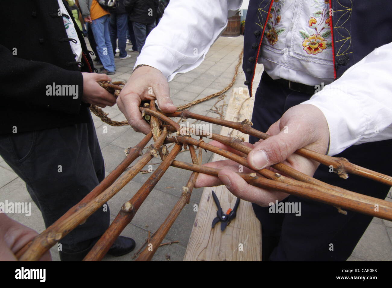 Boys in folk customs carry a giant "pomlazka" (plated willow stems) to ...