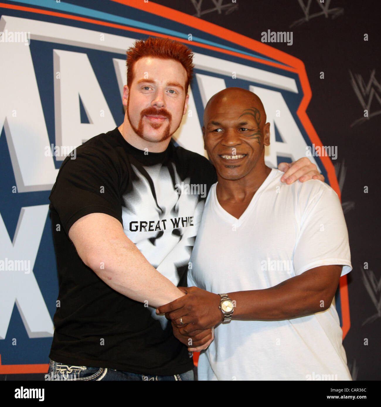 WWE Superstar Sheamus poses with boxing legend and actor, Mike Tyson ...