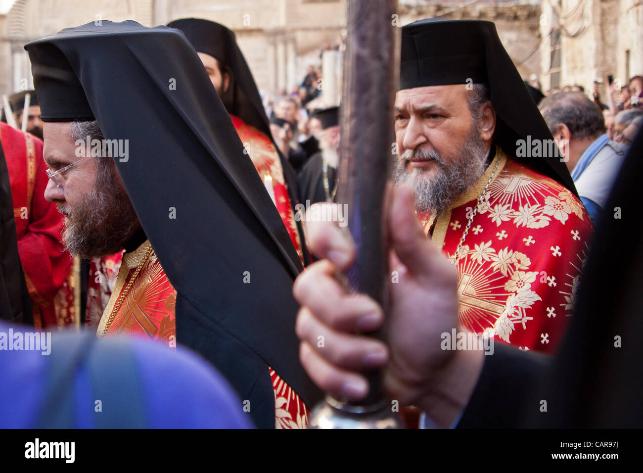 A procession of priests arrives at the courtyard of the Church of the ...