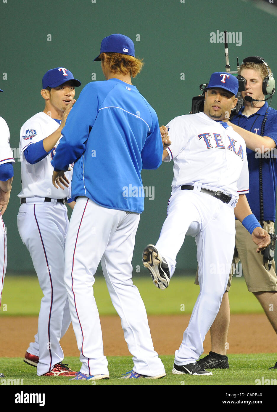 (R-L) Yorvit Torrealba, Yu Darvish, Yoshinori Tateyama (Rangers), APRIL ...