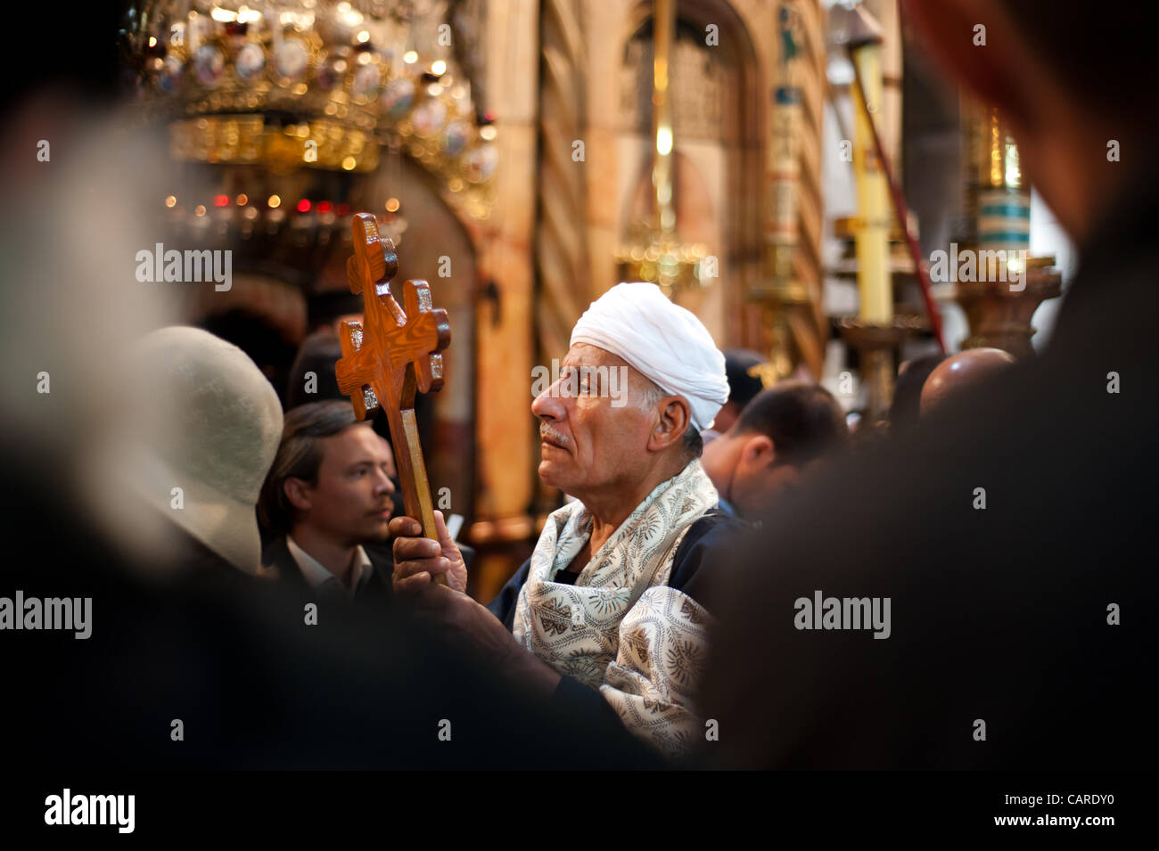 JERUSALEM - APRIL 13: An Eastern Orthodox pilgrim carries a cross in ...