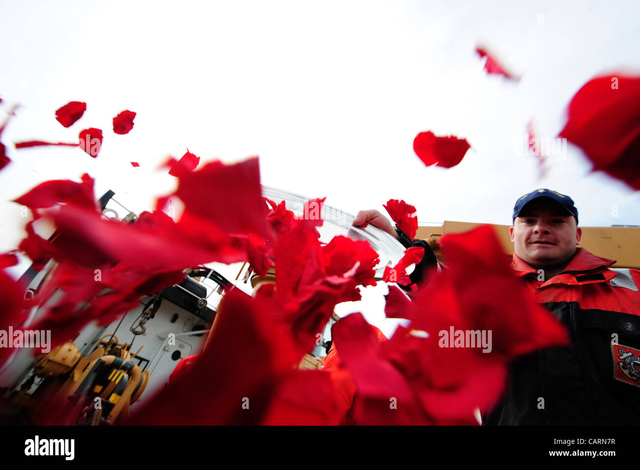 Petty Officer 3rd Class Mark Robinson of the U.S. Coast Guard Cutter ...