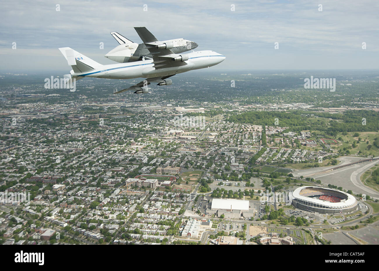 Space shuttle Discovery, mounted atop a NASA 747 Shuttle Carrier ...