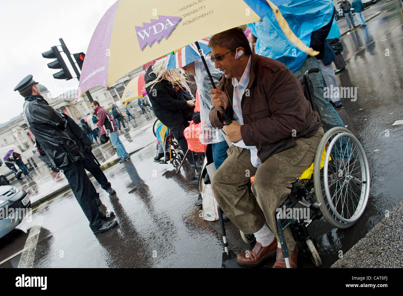 Members of DPAC (Disabled people against cuts) and UKUncut march from ...