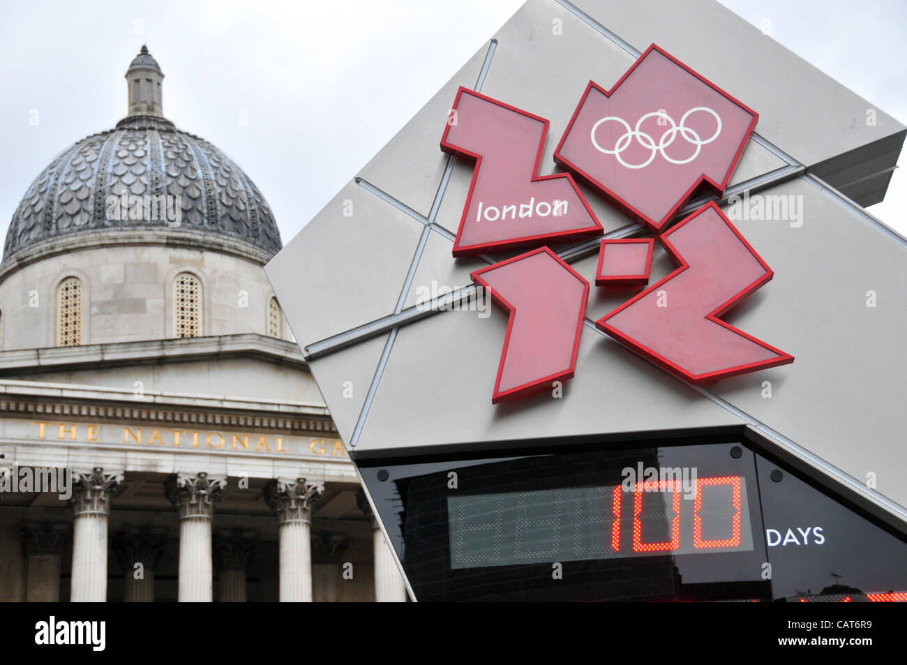 The Olympic clock in Trafalgar Square with The National Gallery in the ...