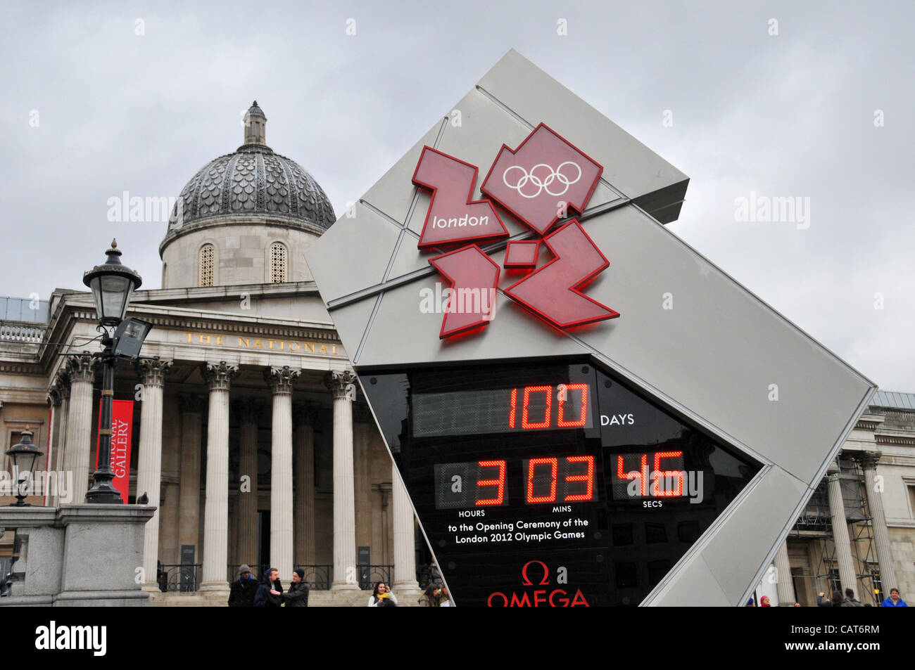 The Olympic clock in Trafalgar Square with The National Gallery in the ...