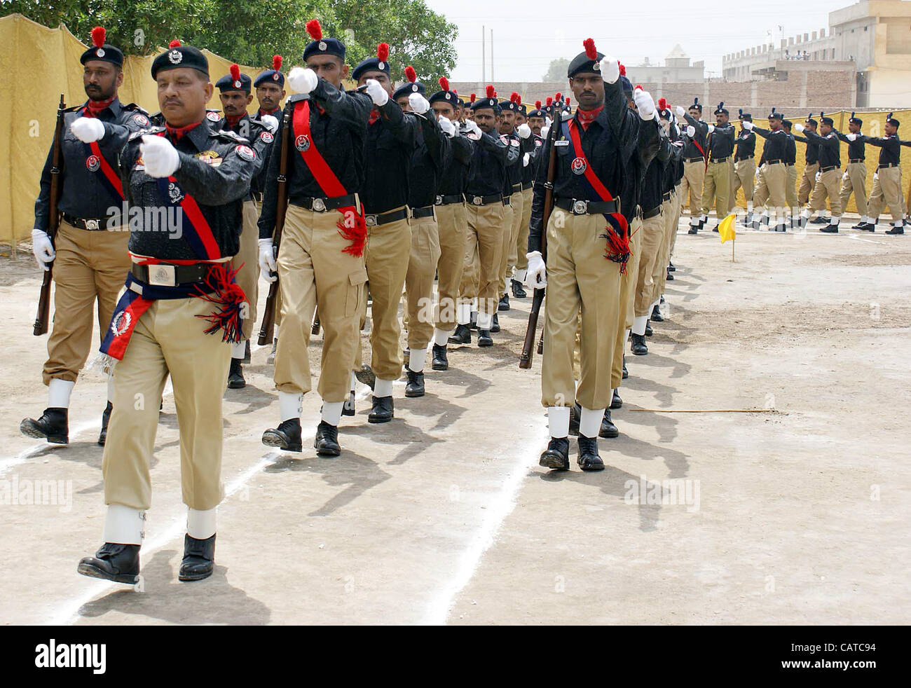 Police recruits march-past during passing out parade ceremony of prison ...