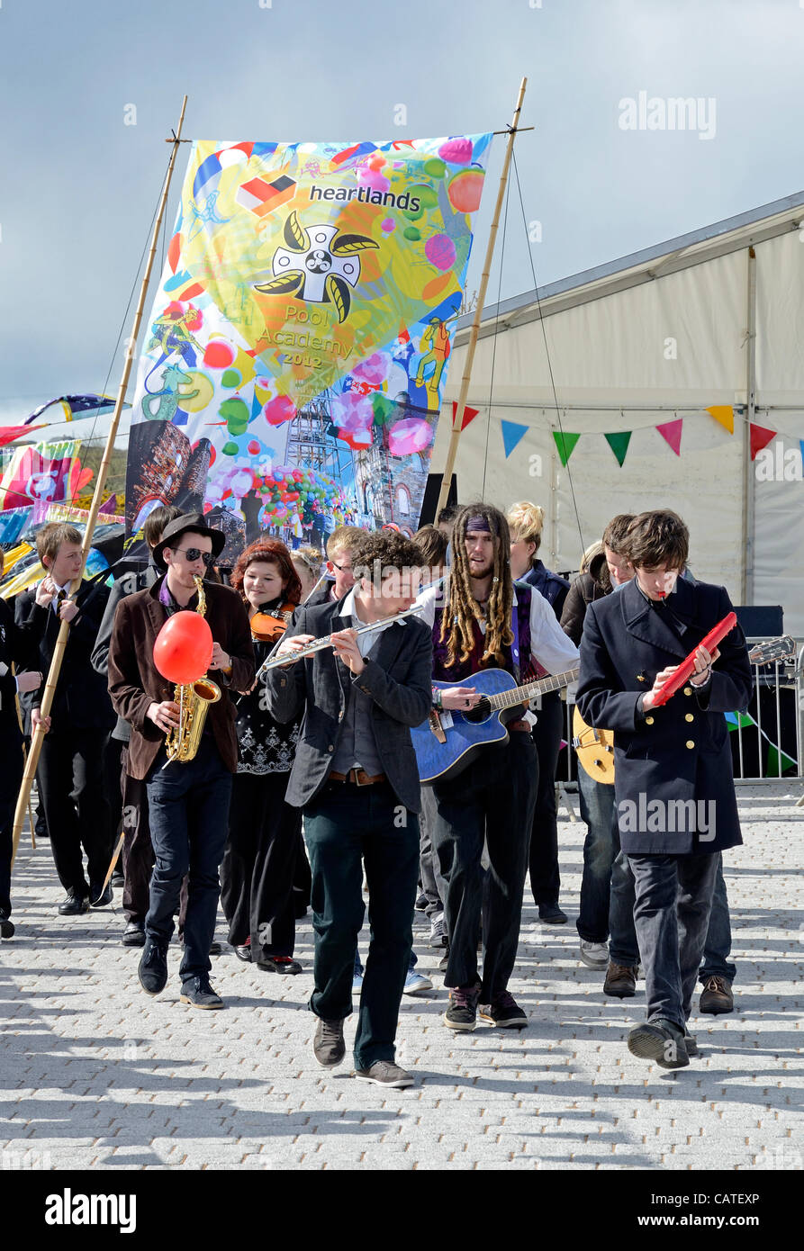 A local band leads the parade on the opening day at the Heartlands ...