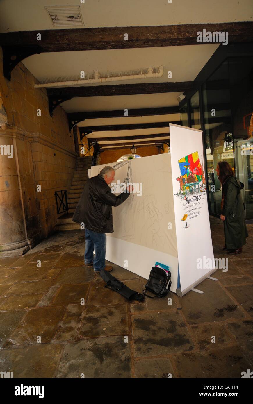 Friday 20, April, 2012, Shrewsbury, U.K. Cartoonist Bill Stott drawing ...