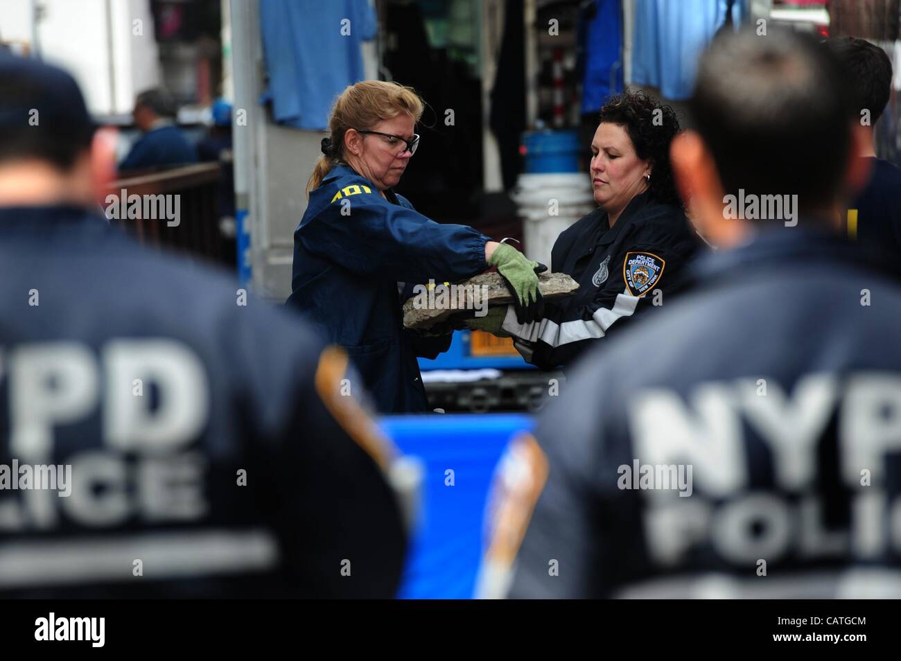 April 20, 2012 - Manhattan, New York, U.S. - FBI agents and members of ...