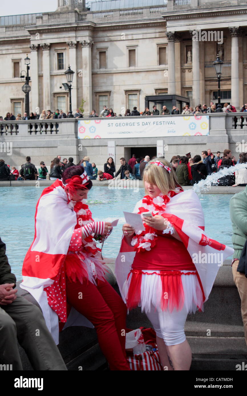 Dressed up for St George's Day in Trafalgar Square Stock Photo - Alamy