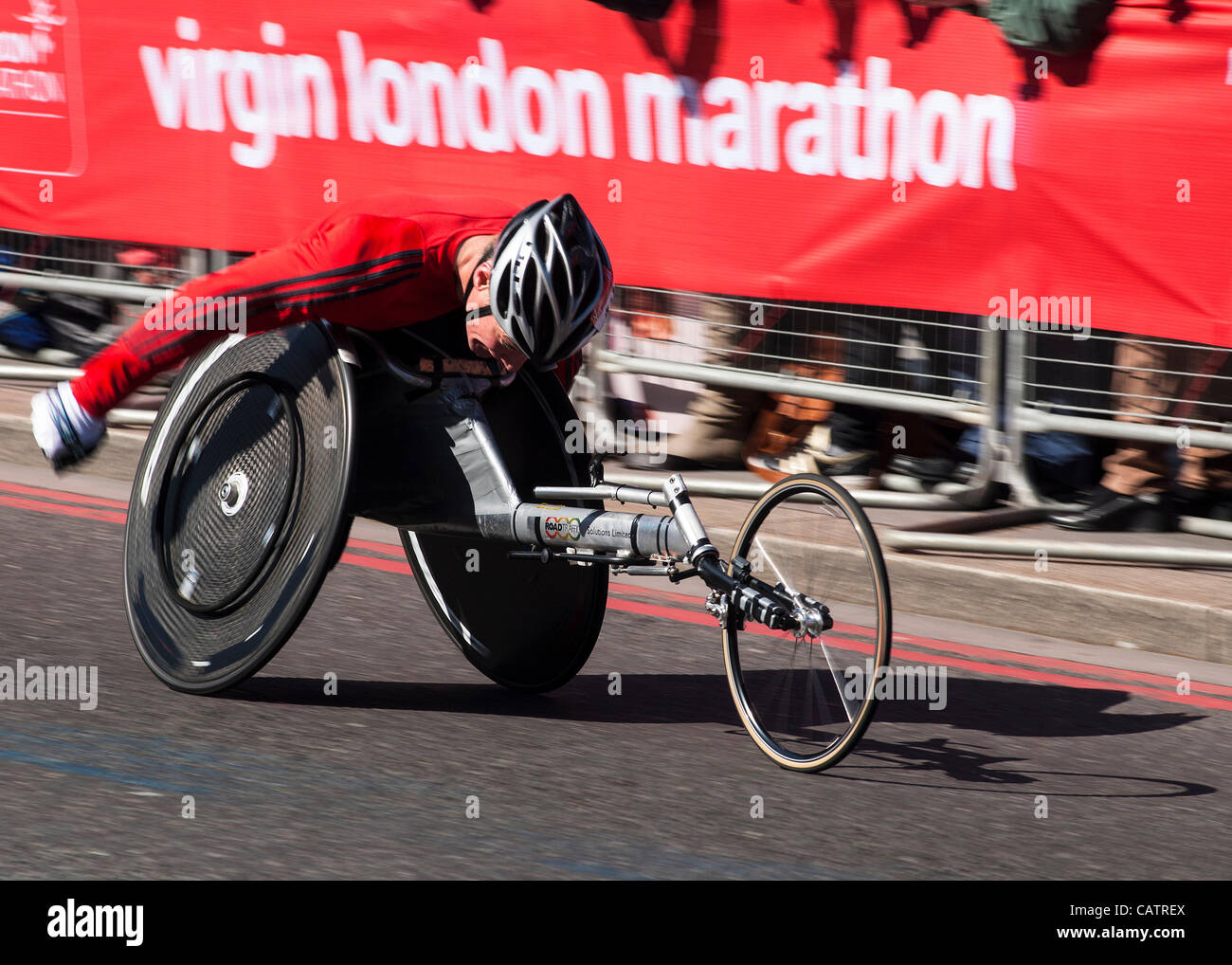 Wheelchair athletes cross Tower Bridge competing in the Virgin London ...