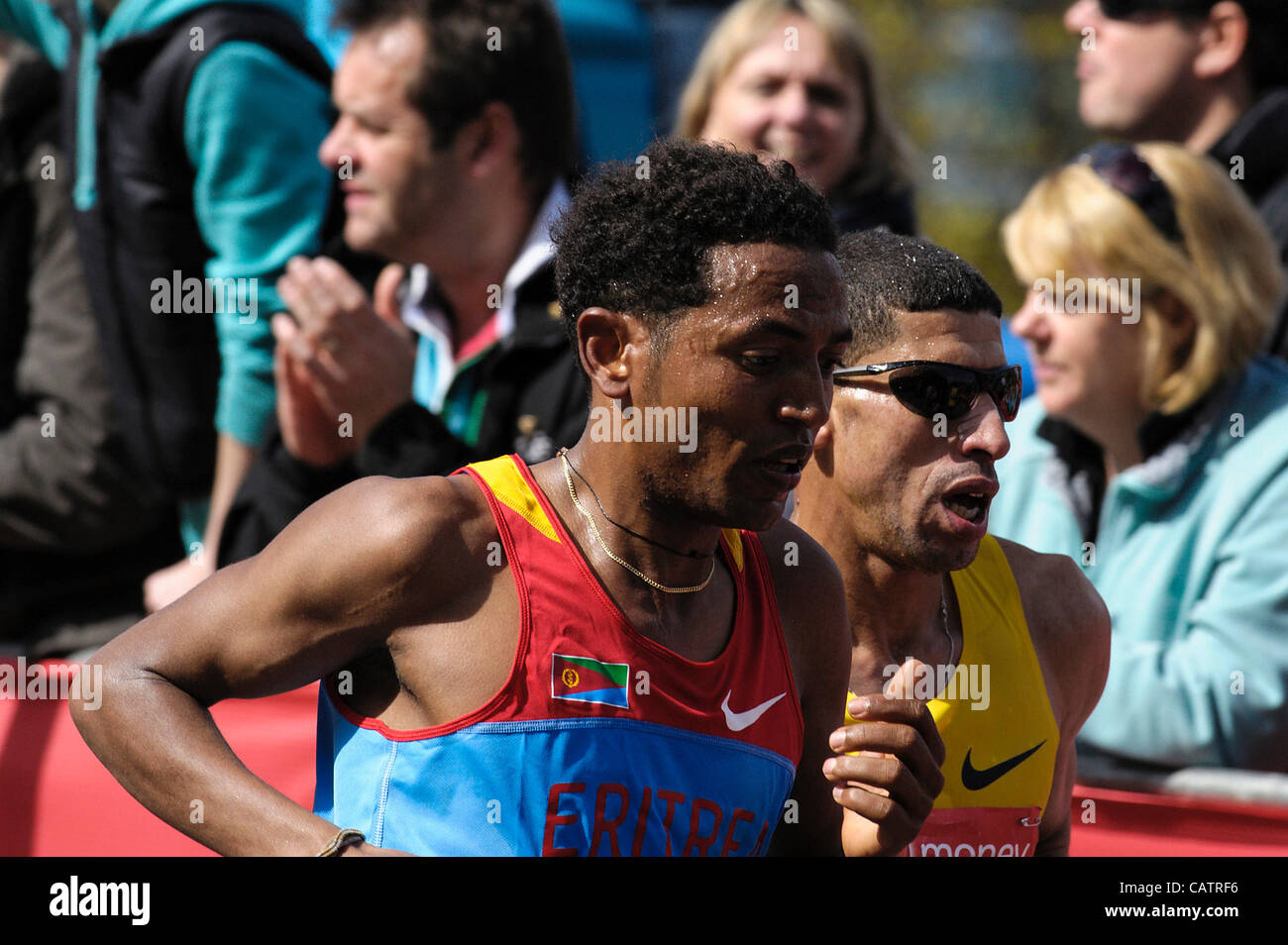 Runners cross Tower Bridge running the London Marathon on 22 April 2012 ...