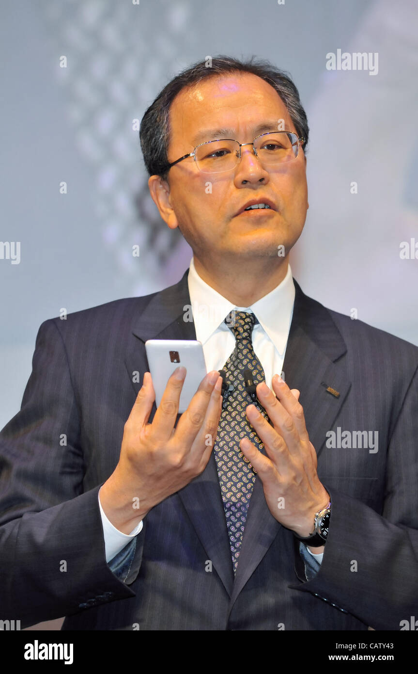 April 20, 2012, Tokyo, Japan - President Takashi Tanaka of KDDI speaks ...
