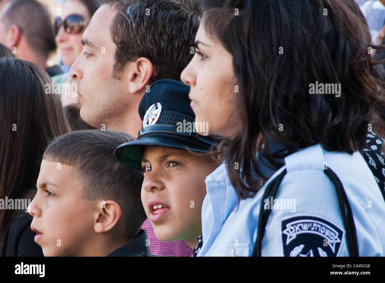 In an audience of hundreds of police officers and their families a ...