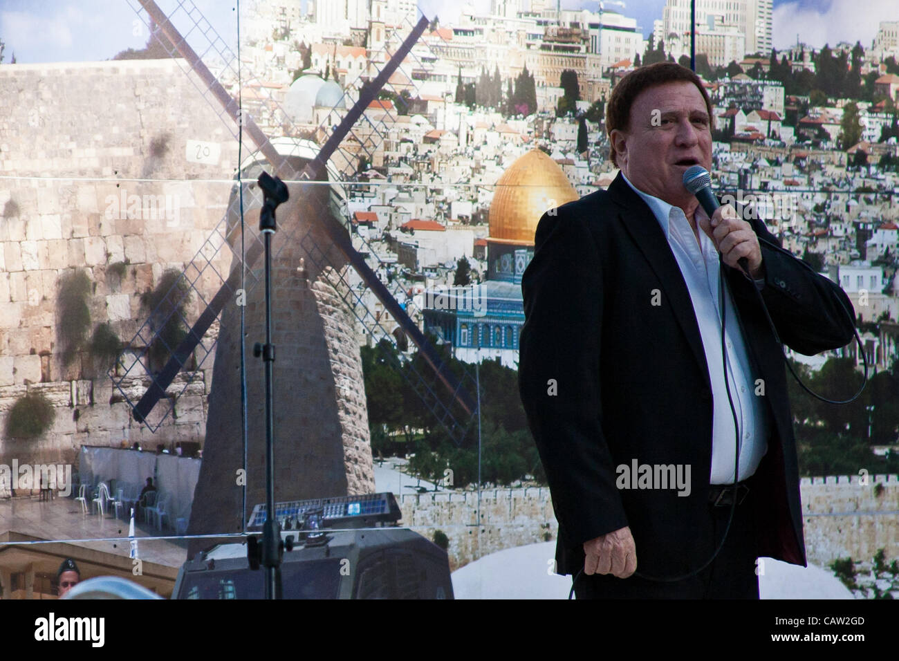 Entertainer, singer and ceremony director, Yehoram Gaon, sings at a ...