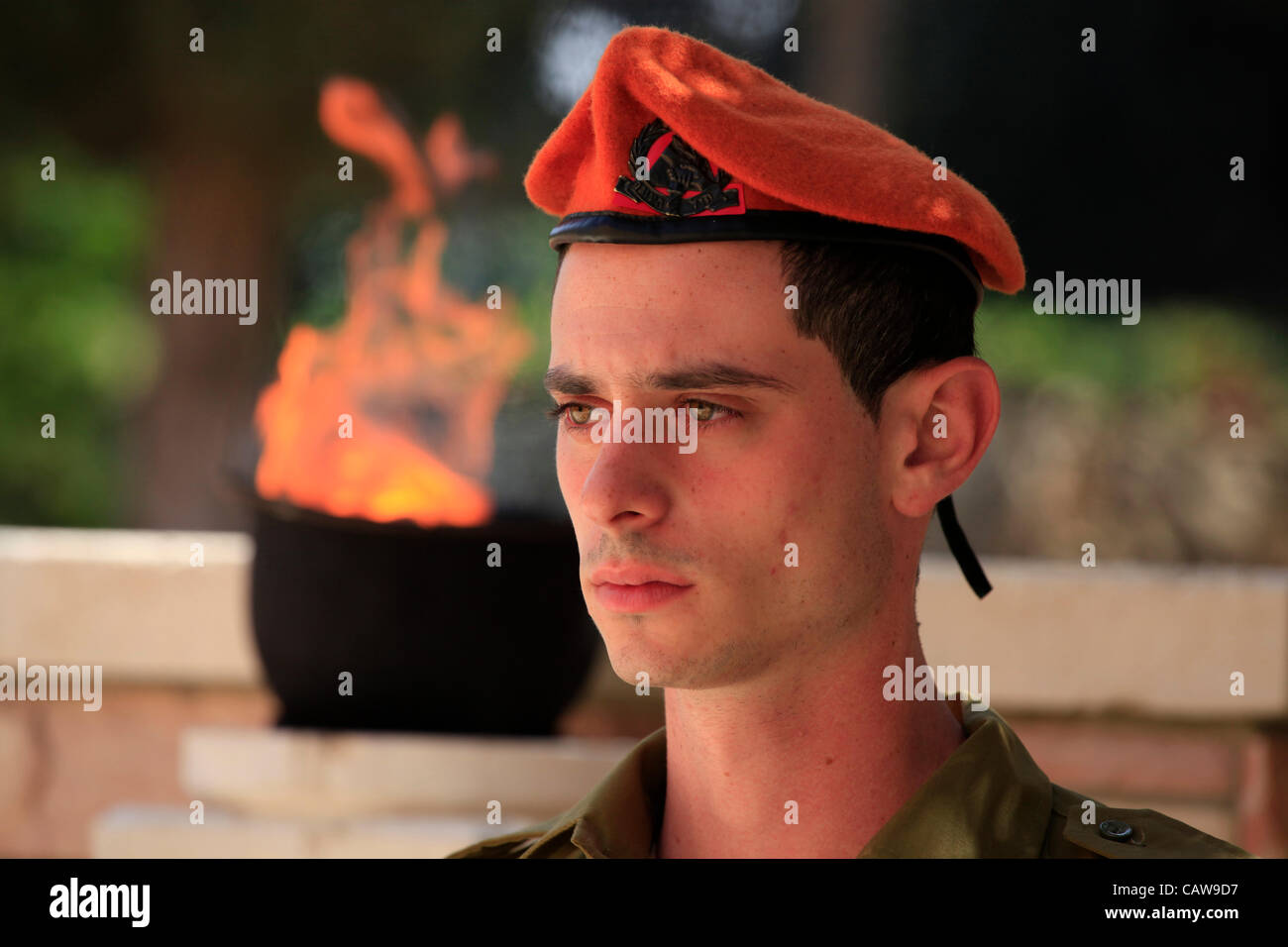 Israeli soldier from the Home Front Command unit stands firm over the ...