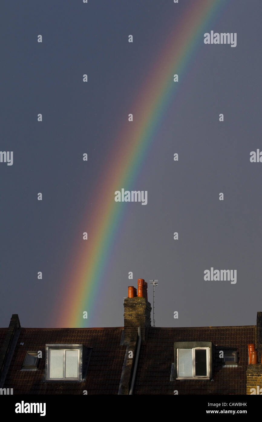 Rainbow seen over houses in London, United Kingdom Stock Photo - Alamy