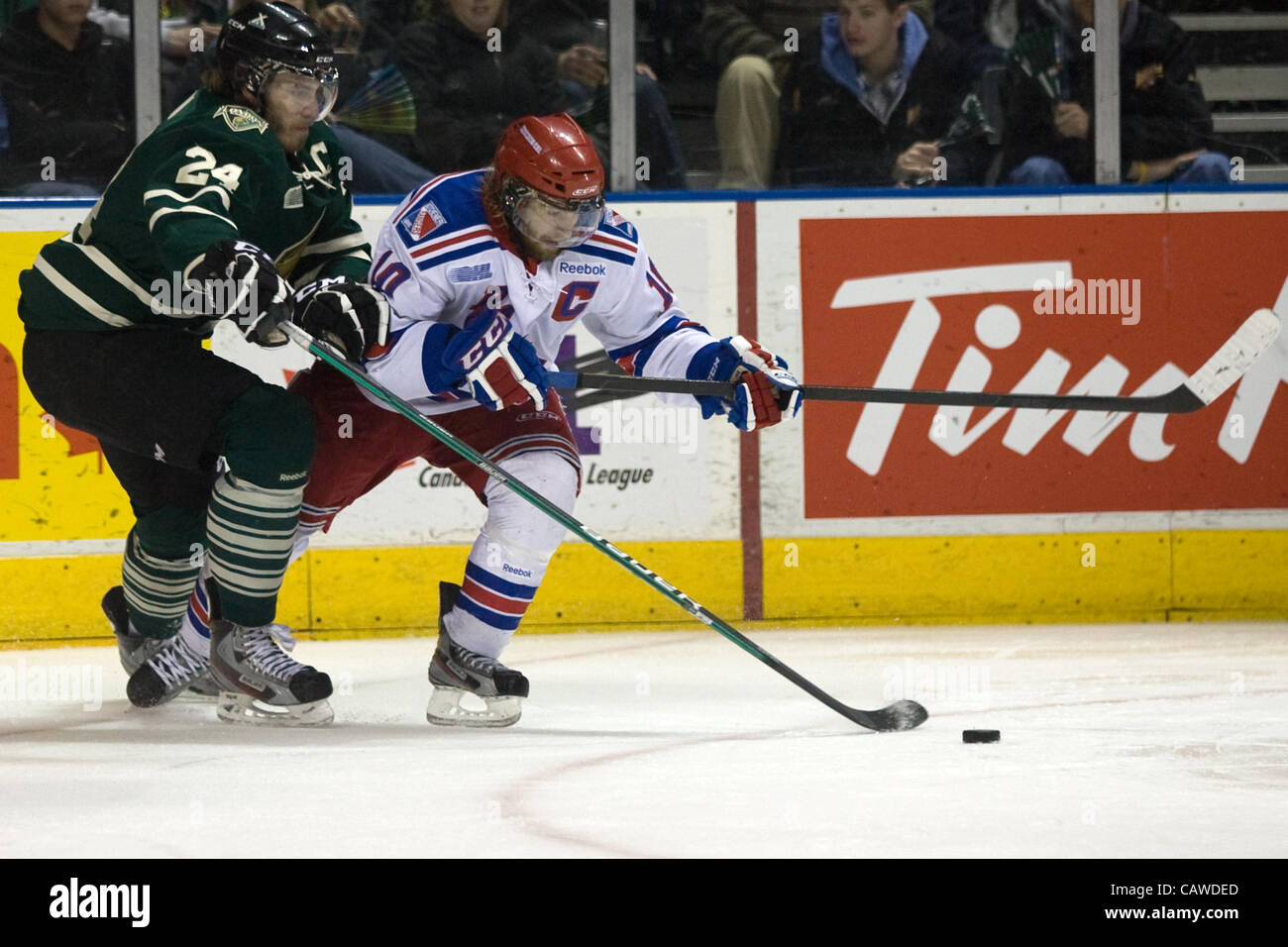 April 24, 2012. Jarred Tinordi (24) of the London Knights battles with ...
