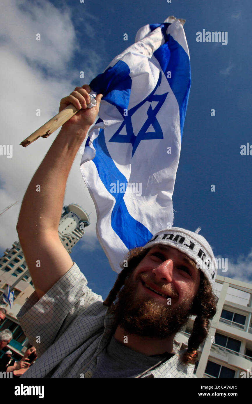 A religious Jew wearing typical large "Breslov" white knitted "Na ...