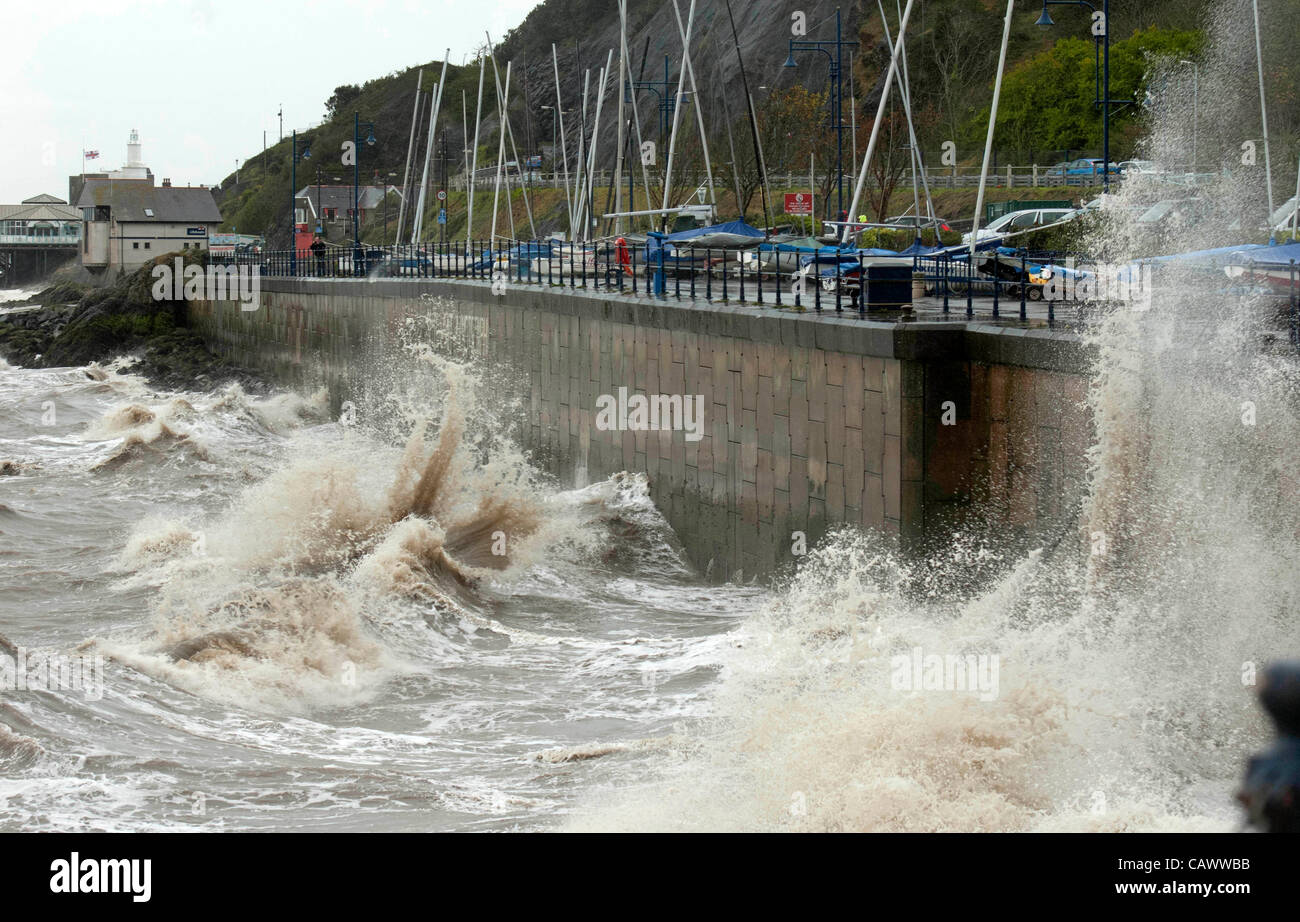 People watching the waves at the Knab Rock carpark in Mumbles near ...