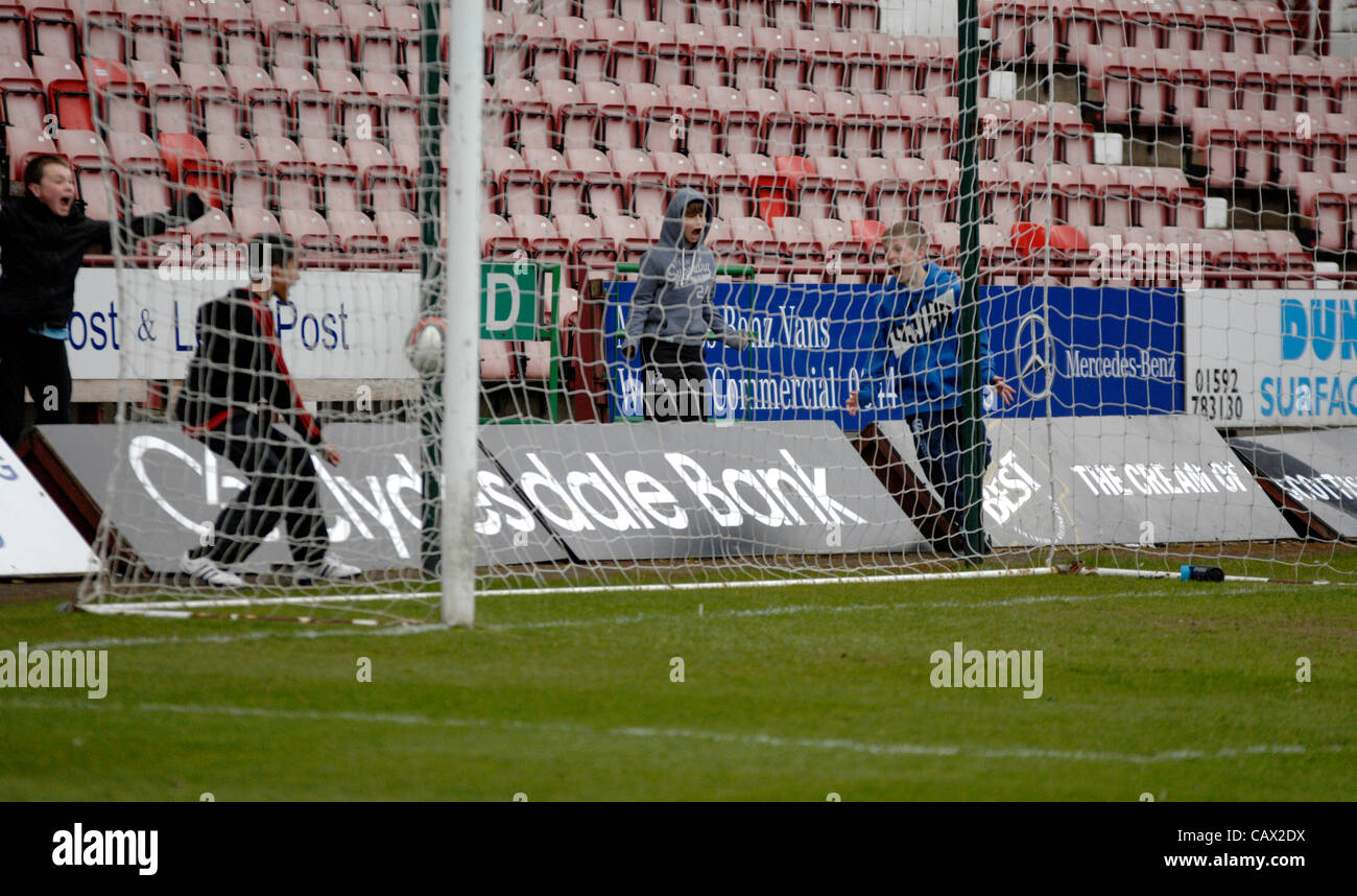 Scotland's Dollar Academy Student Sandy Cunningham's shot hits the back ...