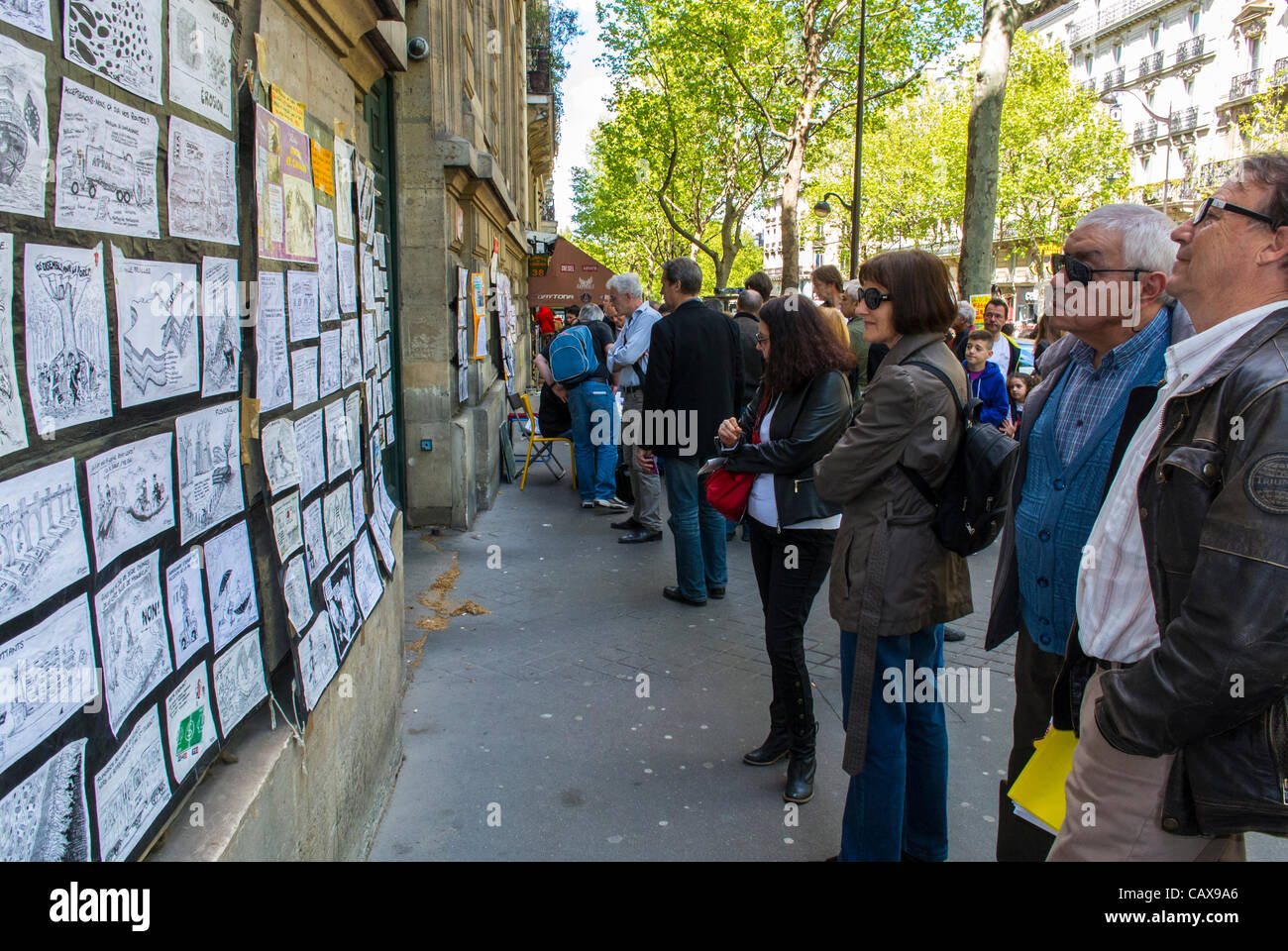 Paris, France, People Looking at Political Cartoons Exhibit on Street ...